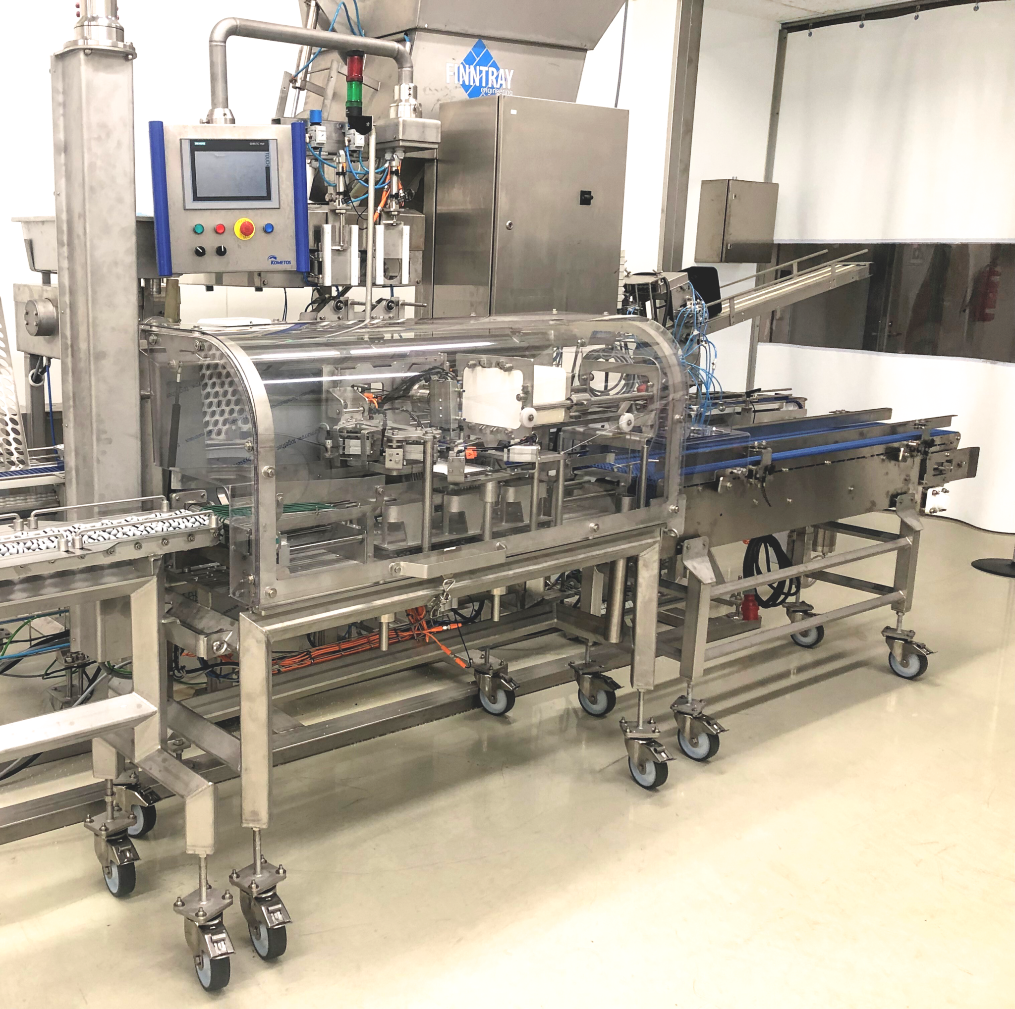 Automated food packaging machines for the food industry - Kometos